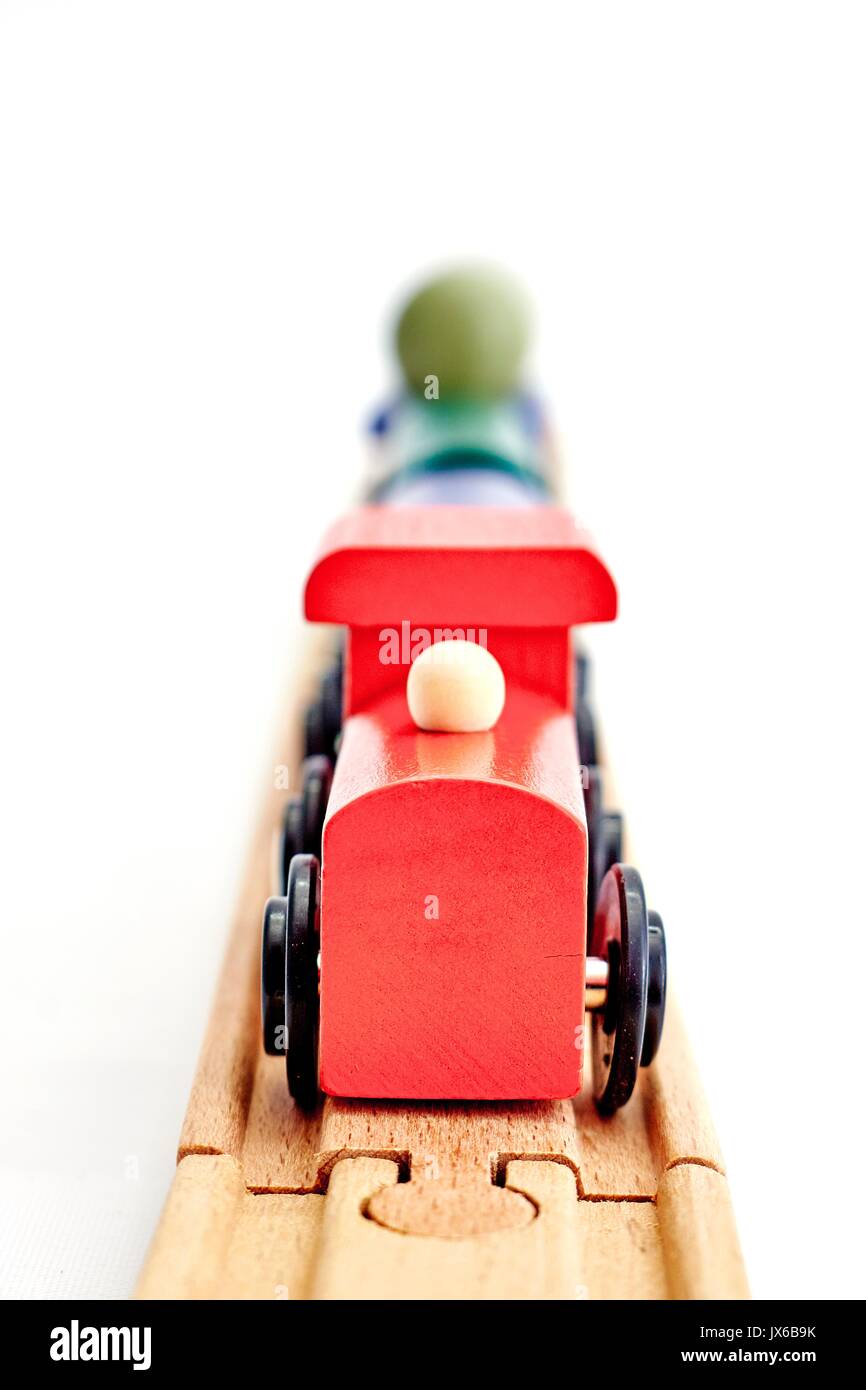 A studio photo of a wooden train track Stock Photo - Alamy