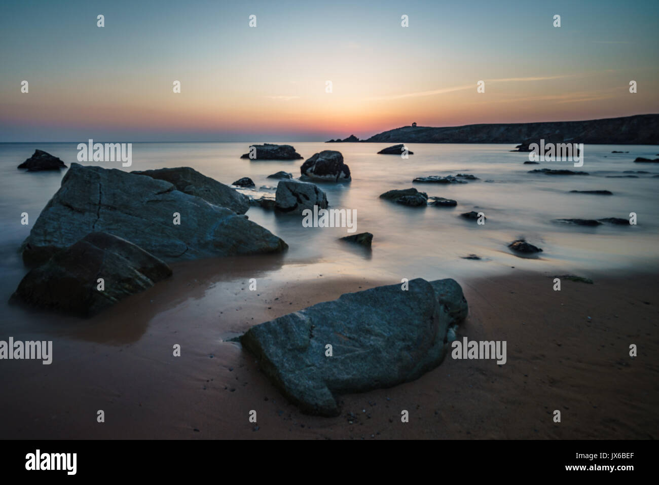 Sunset at Arche de Port Blanc in Saint-Pierre-Quiberon, Brittany ...