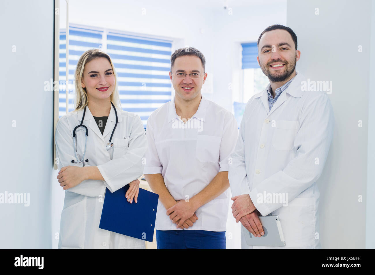 Medical team standing in hall hi-res stock photography and images - Alamy