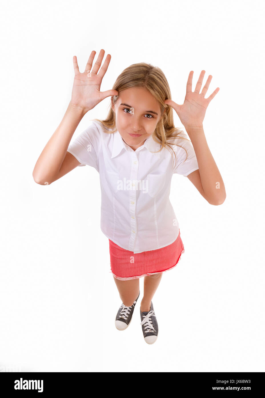 excitement and humor concept -fun high angle full body portrait of ...