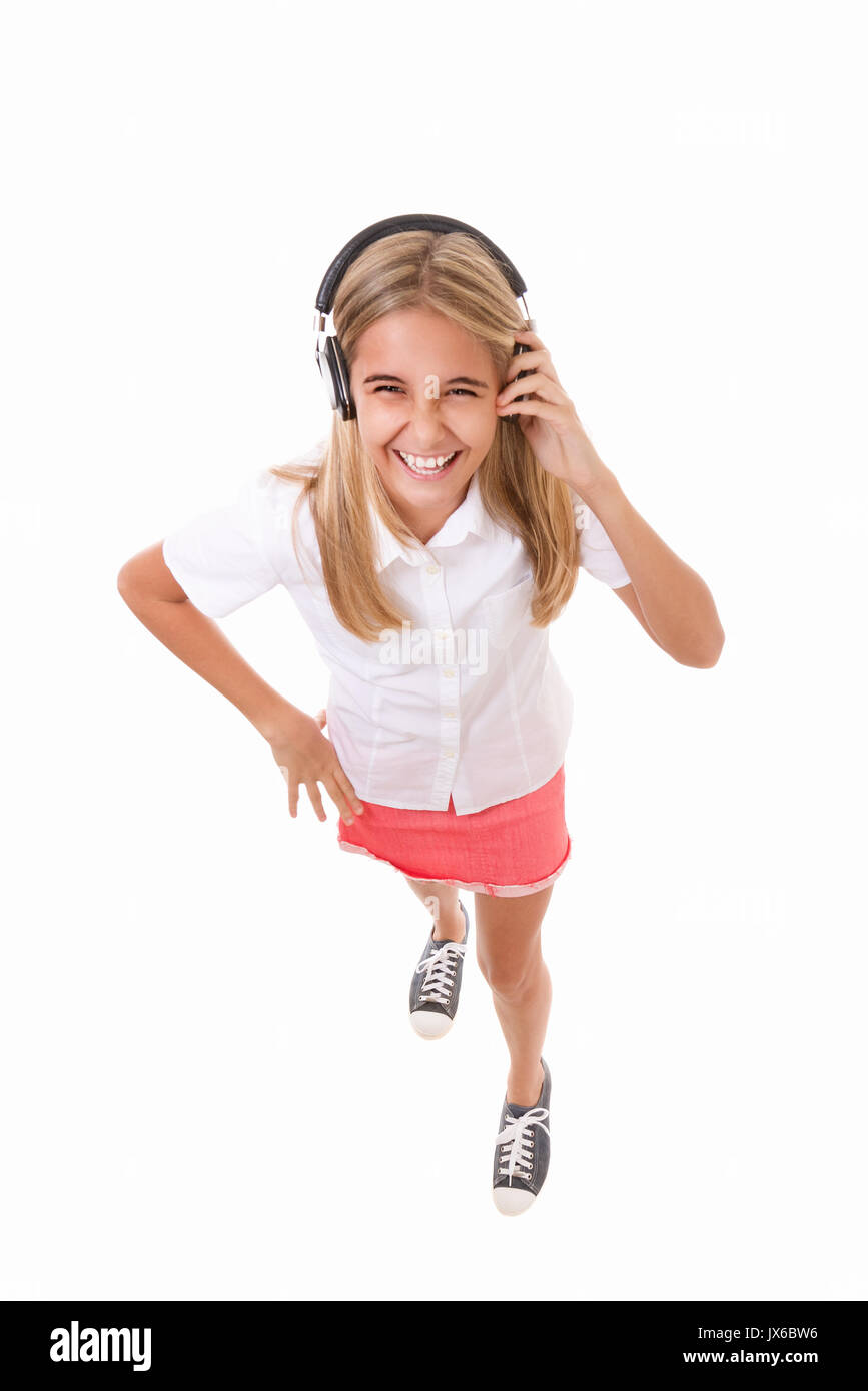 Fun high angle full body portrait of lovely teenage girl with ...