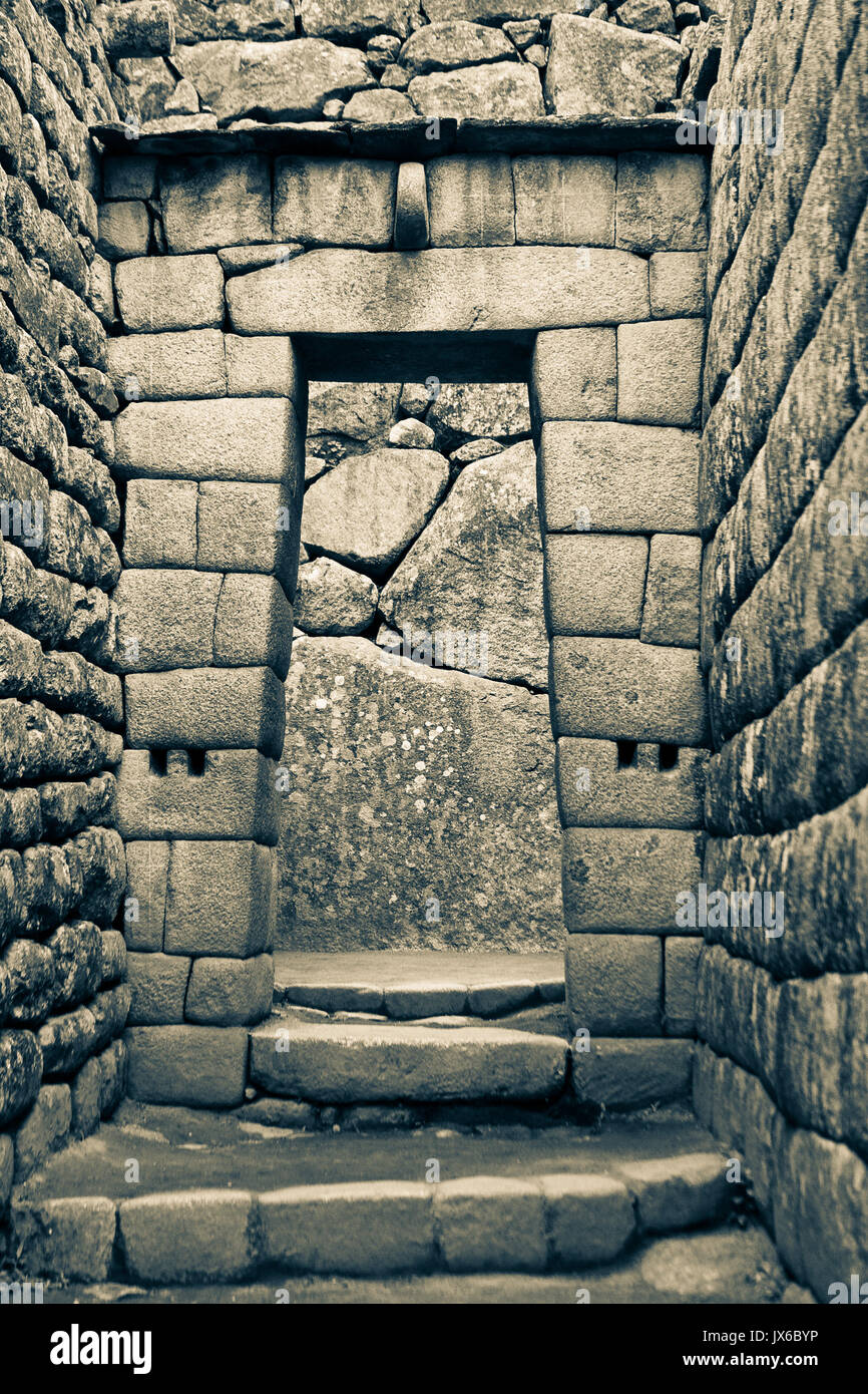 Stone arch in the ancient inca village of Machu Picchu Stock Photo - Alamy
