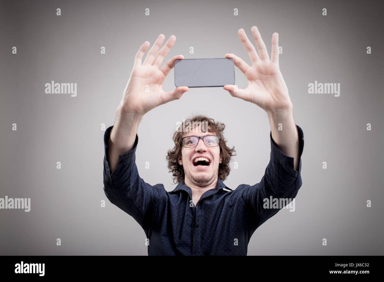 Exaggerated smile hi-res stock photography and images - Alamy