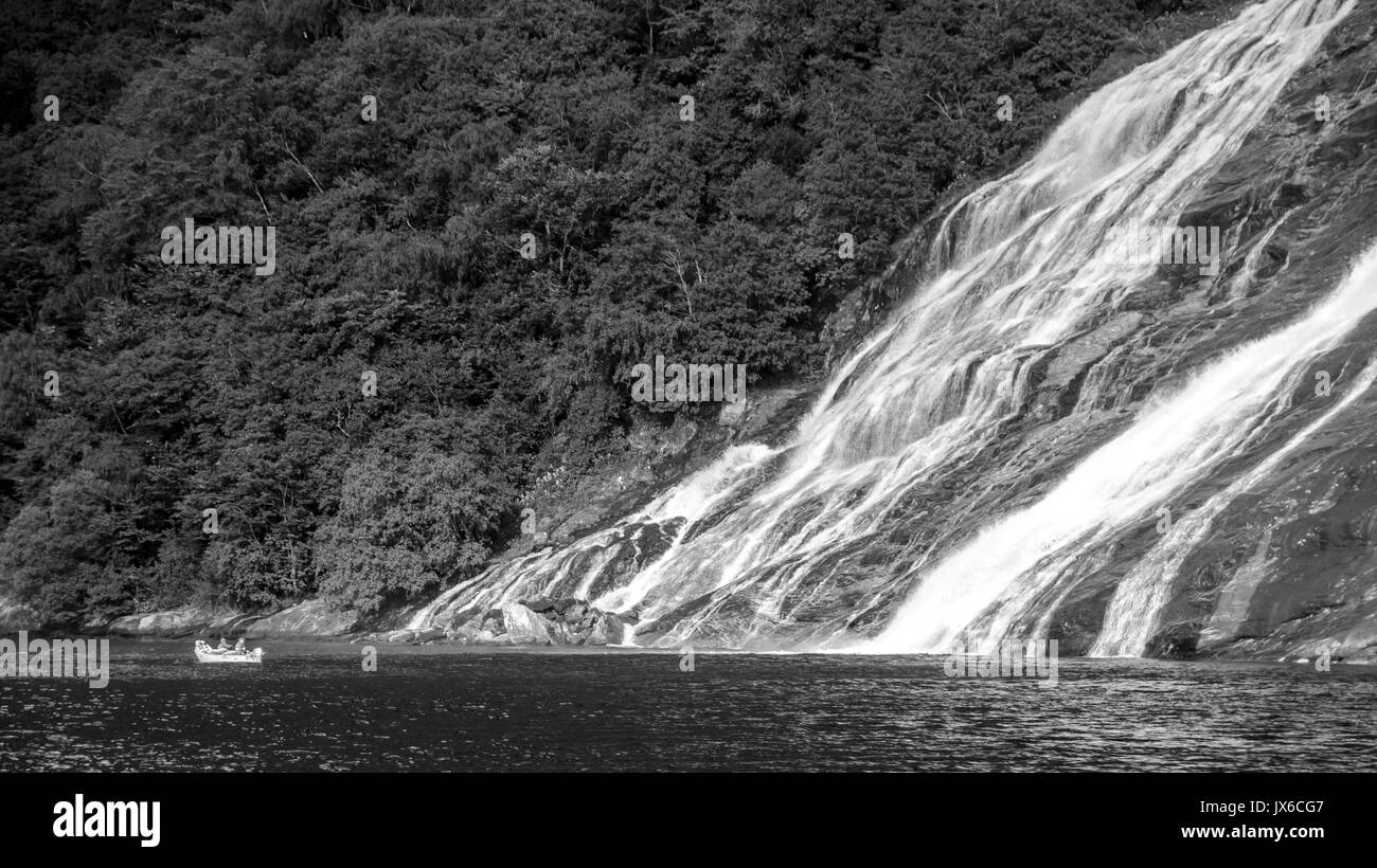 small boat waterfall Stock Photo - Alamy