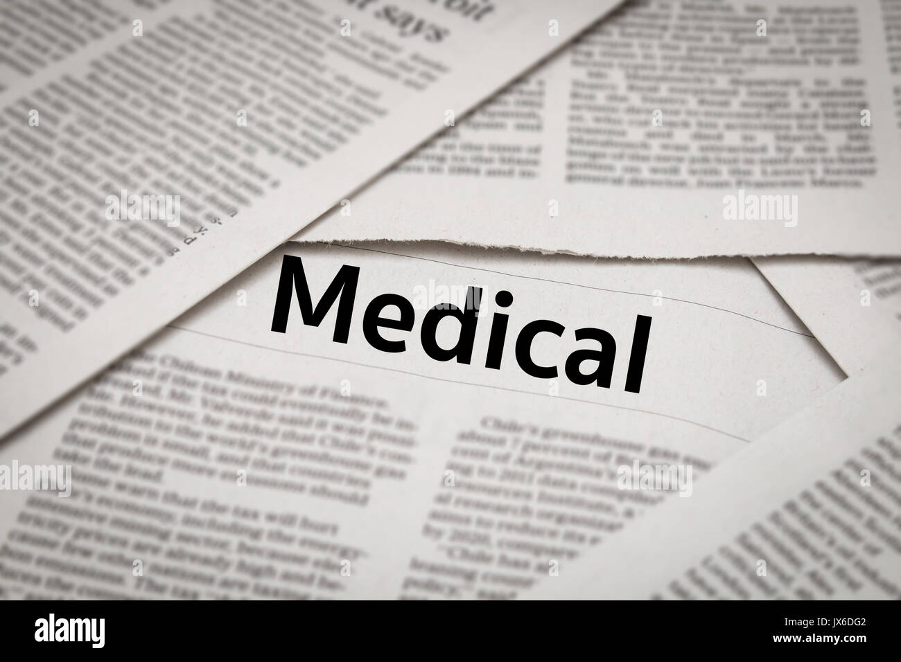 medical headline on newspaper background Stock Photo - Alamy