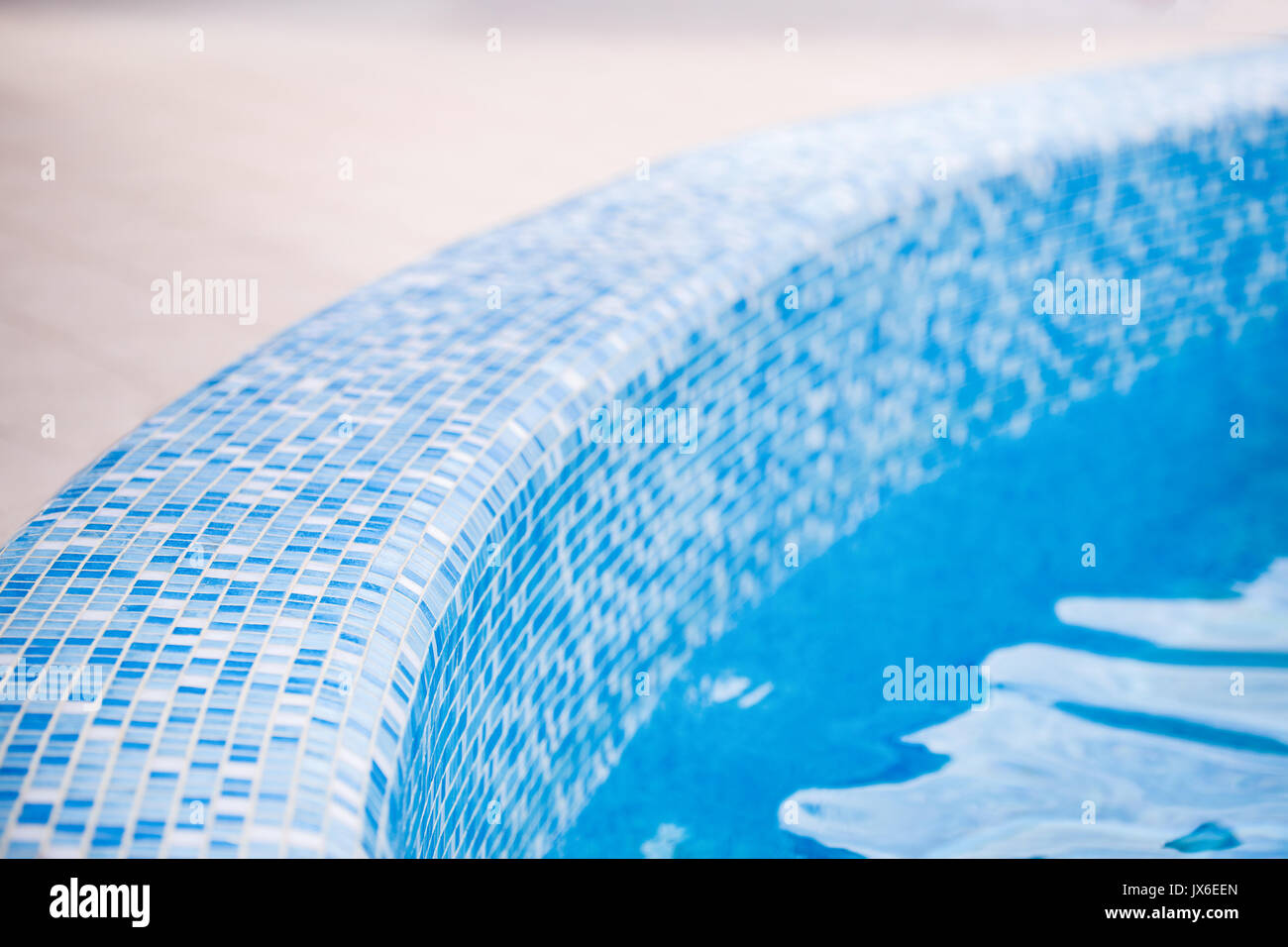 Beautiful curved edge of a swimming pool at a resort or spa Stock Photo ...