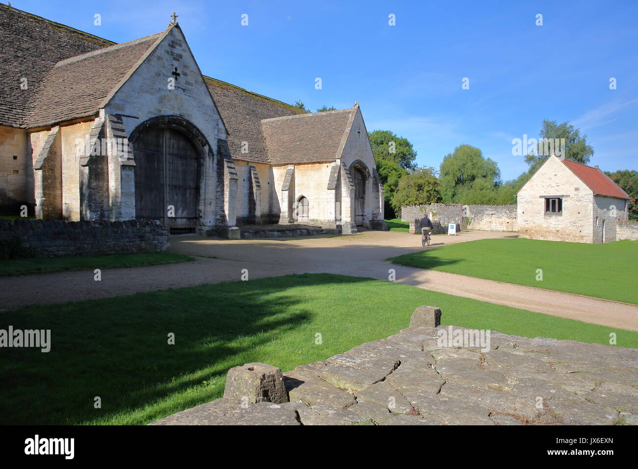 Exterior view of the historic Tithe Barn, a medieval monastic stone ...