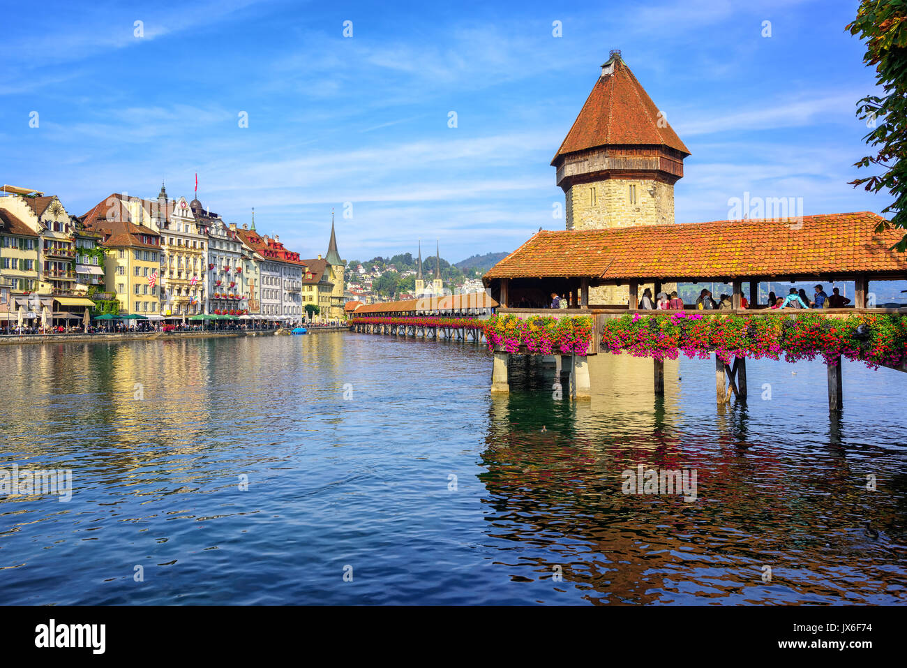 Wooden Chapel Bridge over Reuss river and Water Tower is an iconic ...