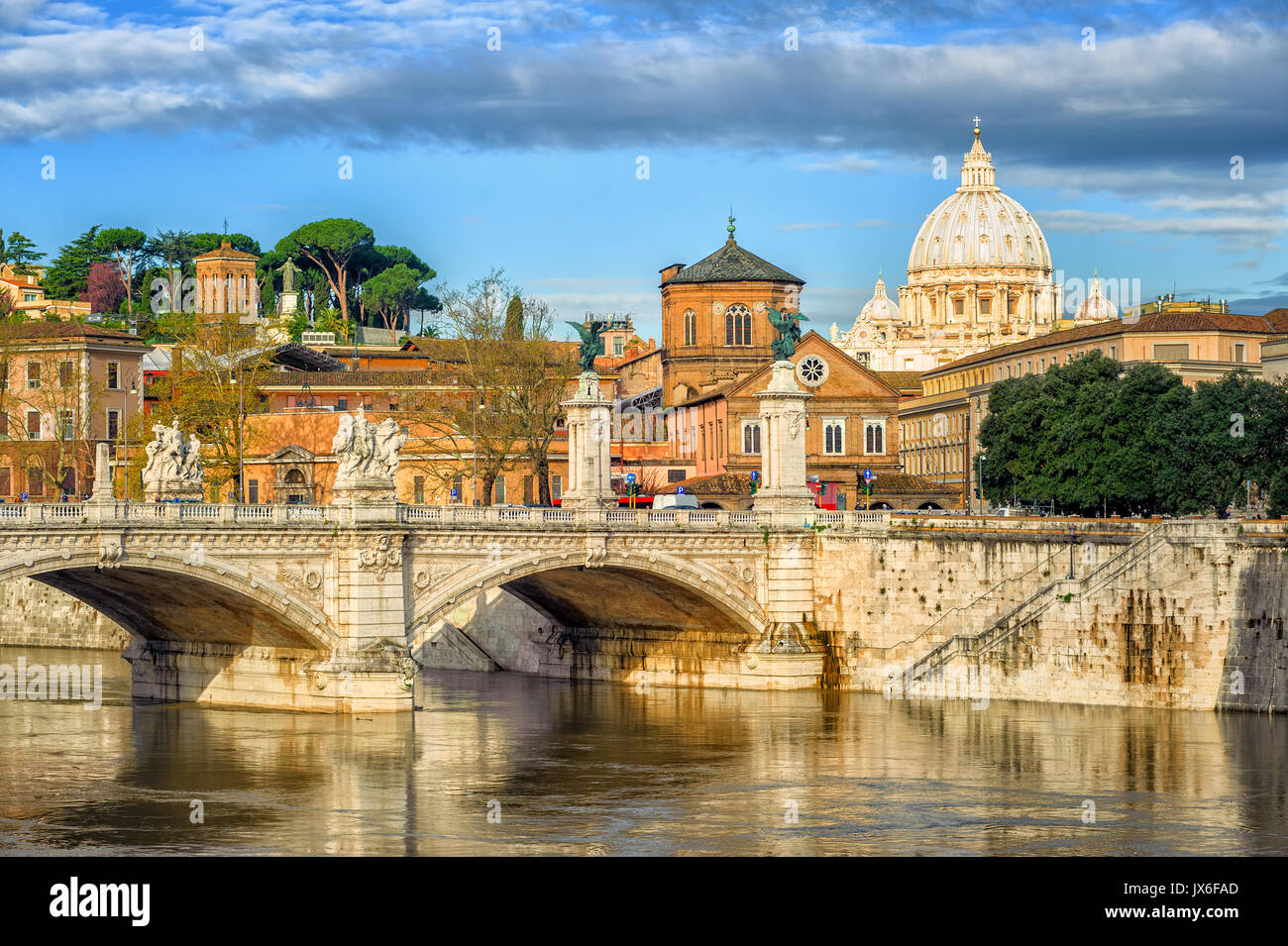 Bridge over Tiber river and Dome of St. Peter Cathedral in Vatican City ...