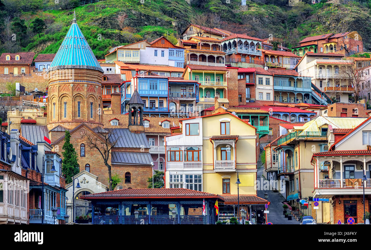 Colorful traditional houses with wooden carved balconies in the Old ...