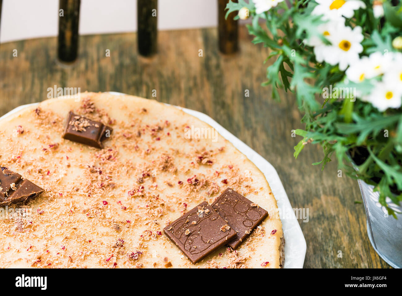 Raw vegan sweet caramel cake made of carob with cashew cream topped ...