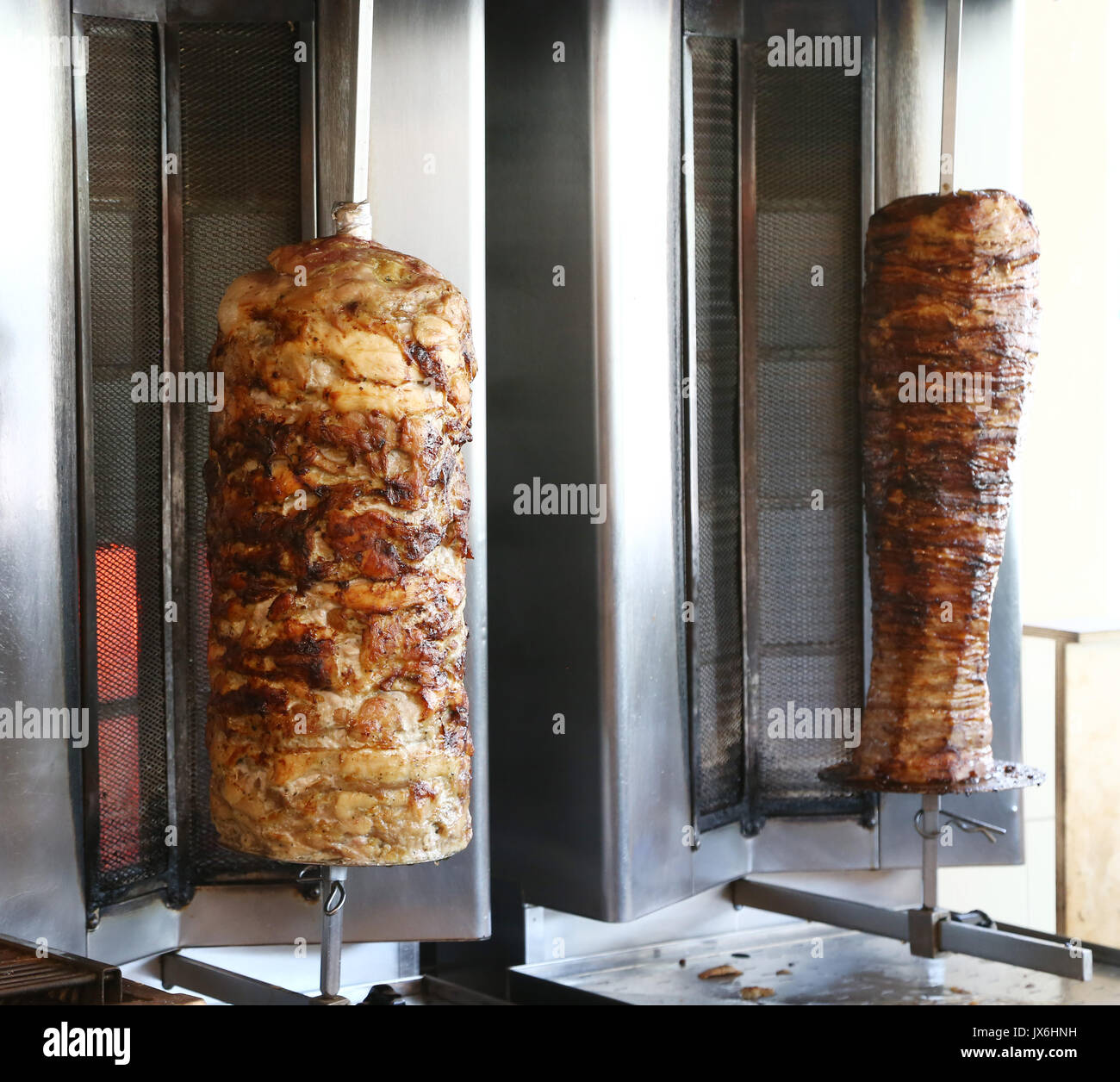 Greek traditional grilled gyros meat with pork and chicken Stock Photo ...