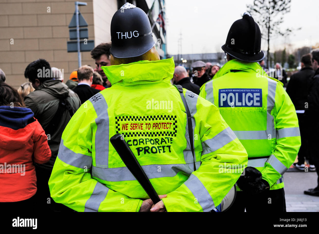 Protester dressed in a mock police uniform and wearing a pig mask Stock ...
