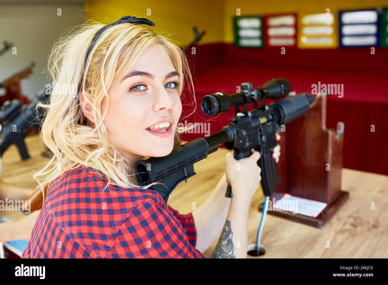 Shooting practice woman gun hi-res stock photography and images - Alamy