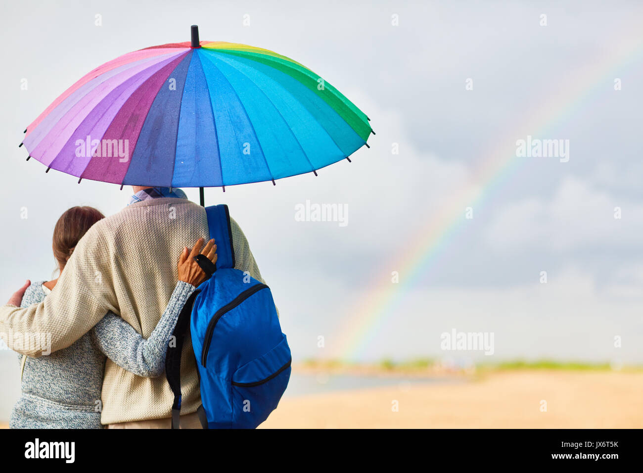 Man woman embrace rain hi-res stock photography and images - Alamy