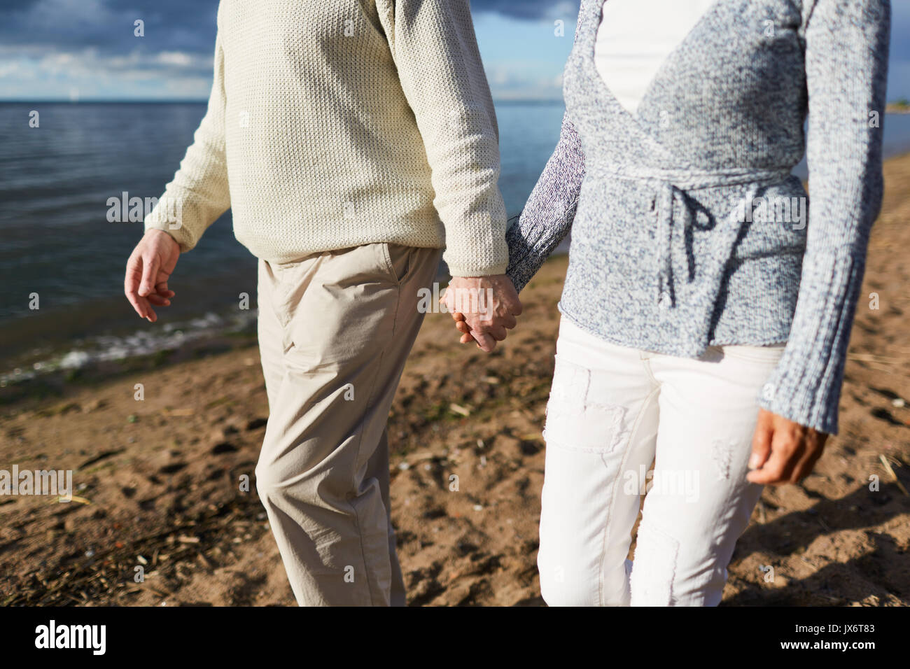 Beach walk retired hi-res stock photography and images - Alamy