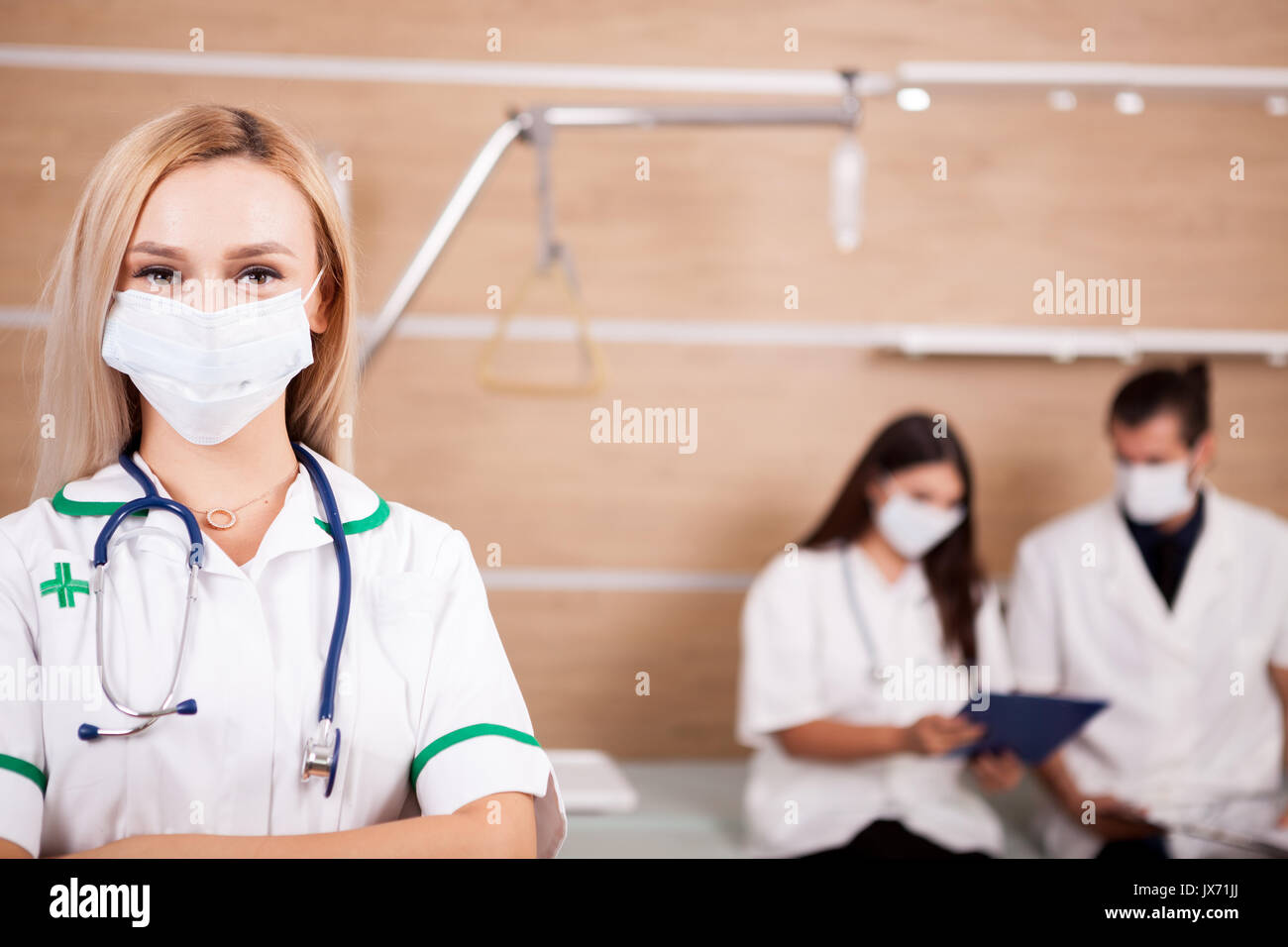 Portrait of confident doctor medical team with masks on face Stock ...