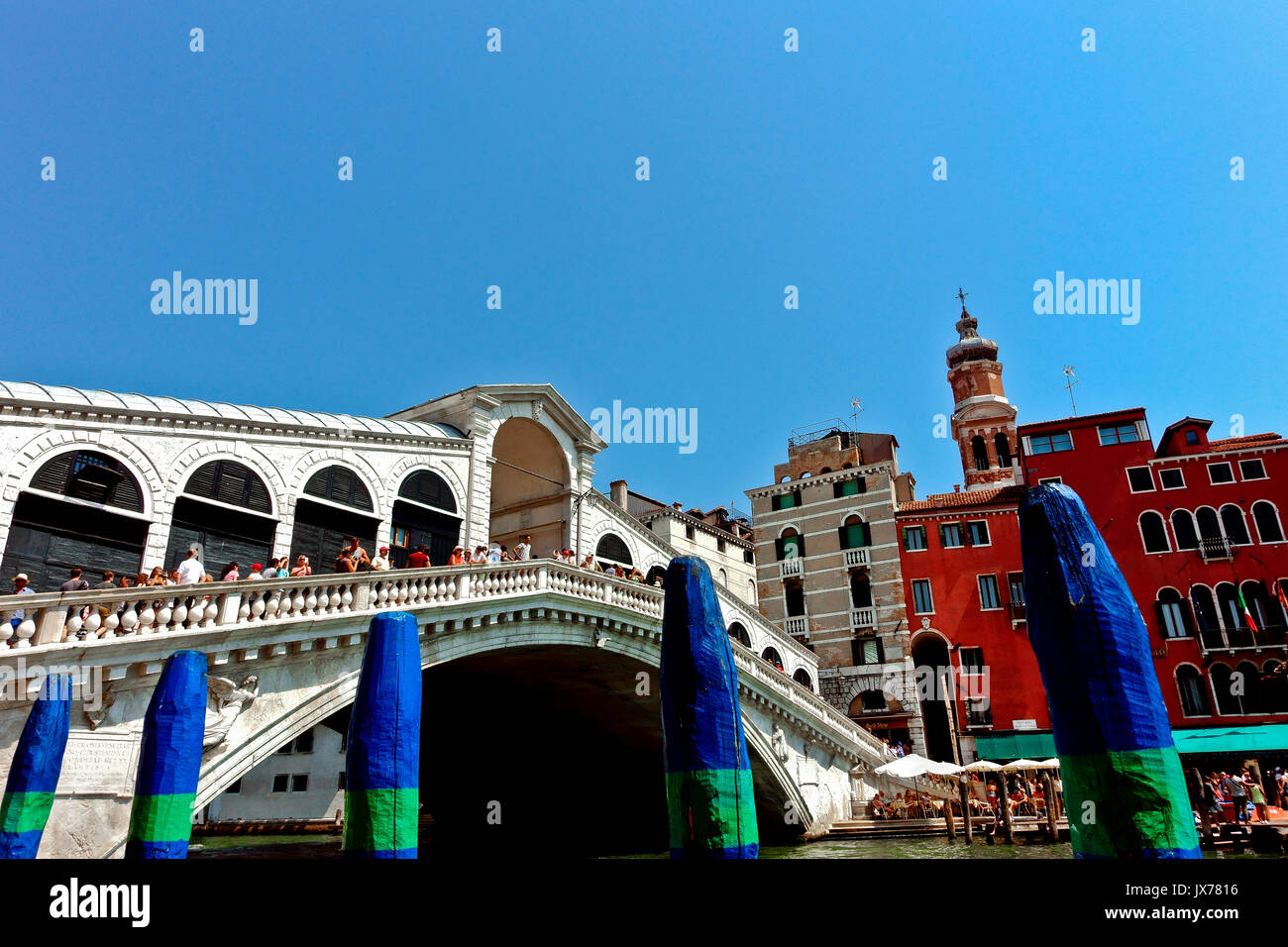 The Rialto Bridge, stone bridge and pillars on the Grand Canal. Ponte ...