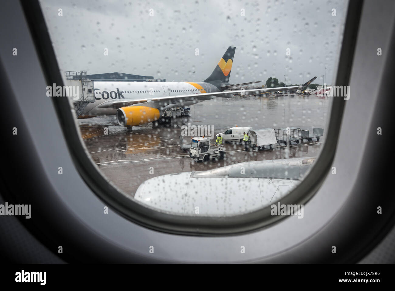 View from an airplane window on the runway at Manchester Airport in the ...