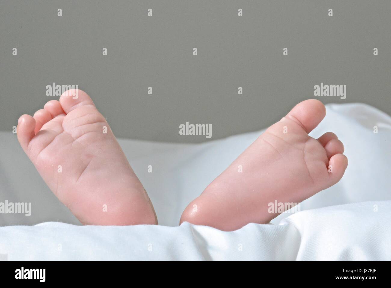 Two human feet hi-res stock photography and images - Alamy
