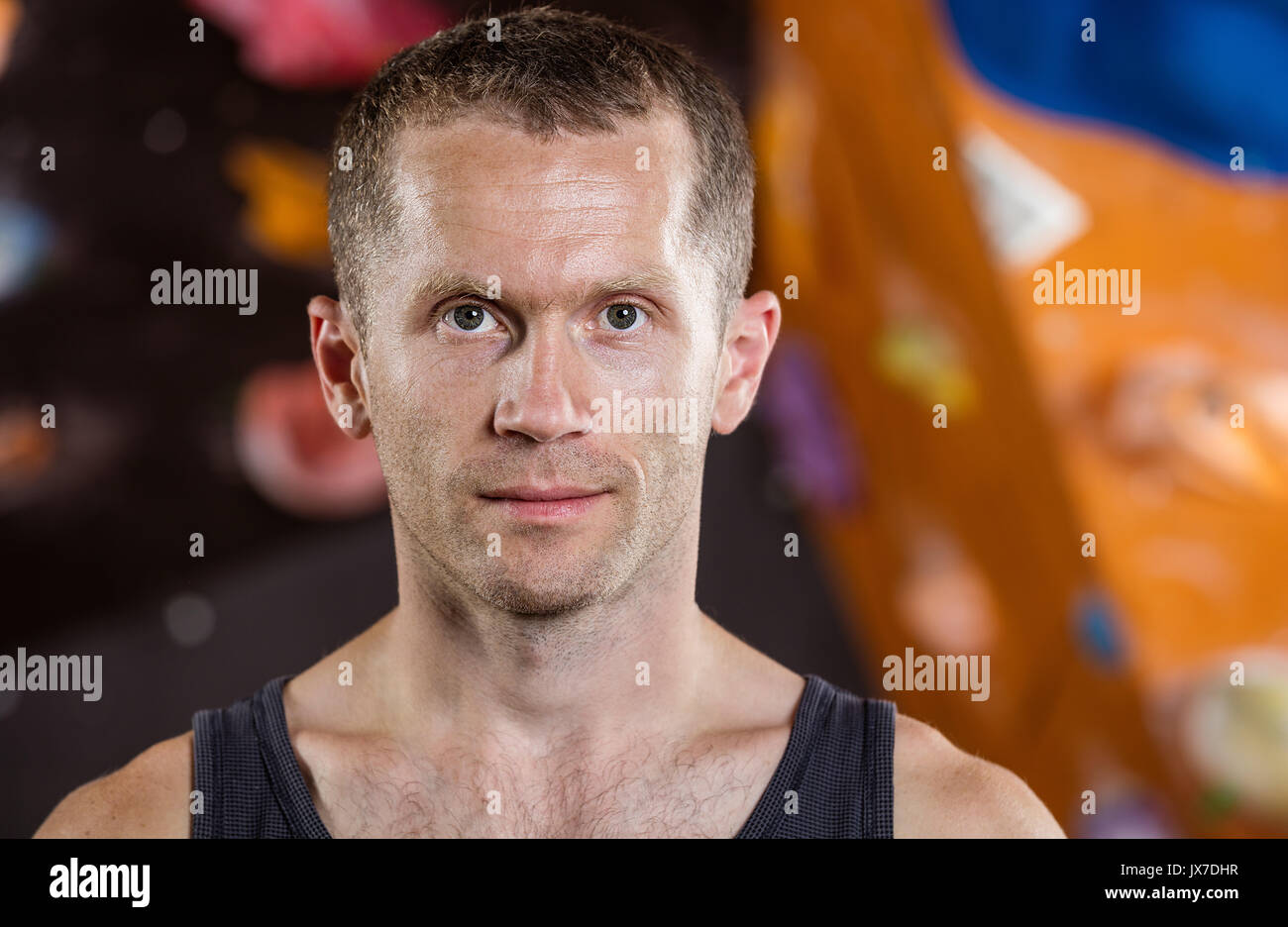 Closeup portrait of rock climber in indoor climbing gym Stock Photo - Alamy