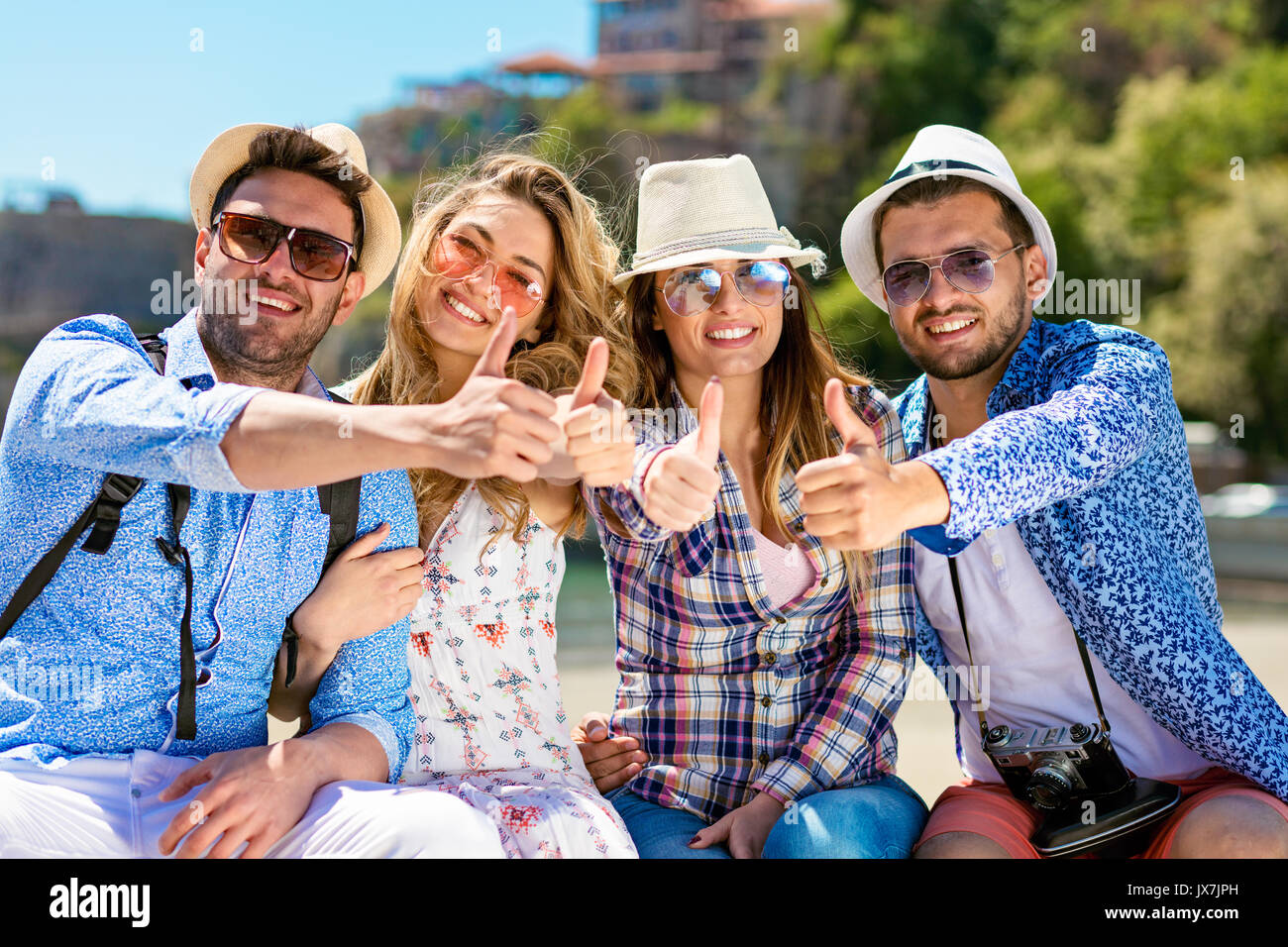 Group of friends taking funny portraits outdoor Stock Photo - Alamy