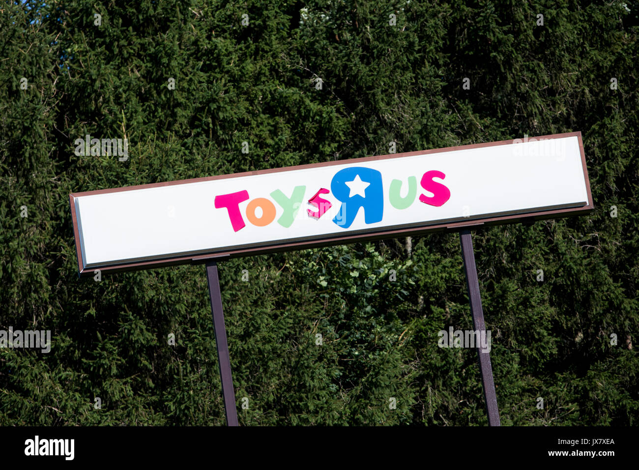 A logo sign outside of a Toys "R" Us, Inc., retail store in Lancaster ...