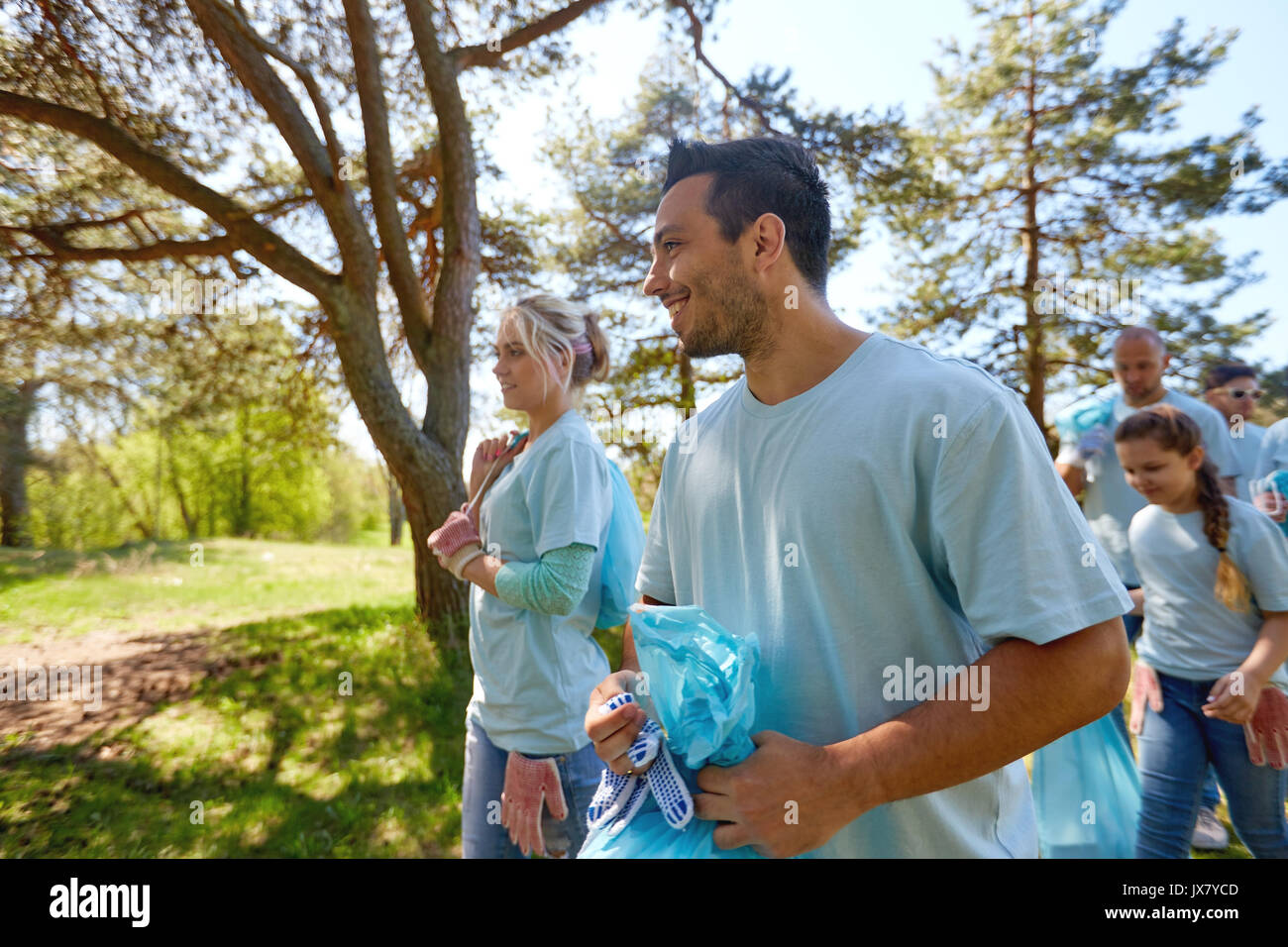 volunteers with garbage bags walking outdoors Stock Photo - Alamy