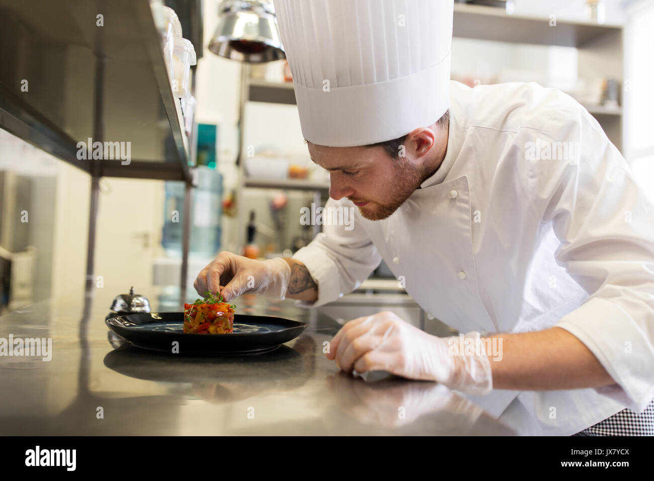 happy male chef cooking food at restaurant kitchen Stock Photo - Alamy