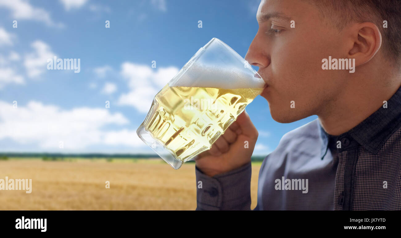 Man drinking beer from glass hi-res stock photography and images - Alamy