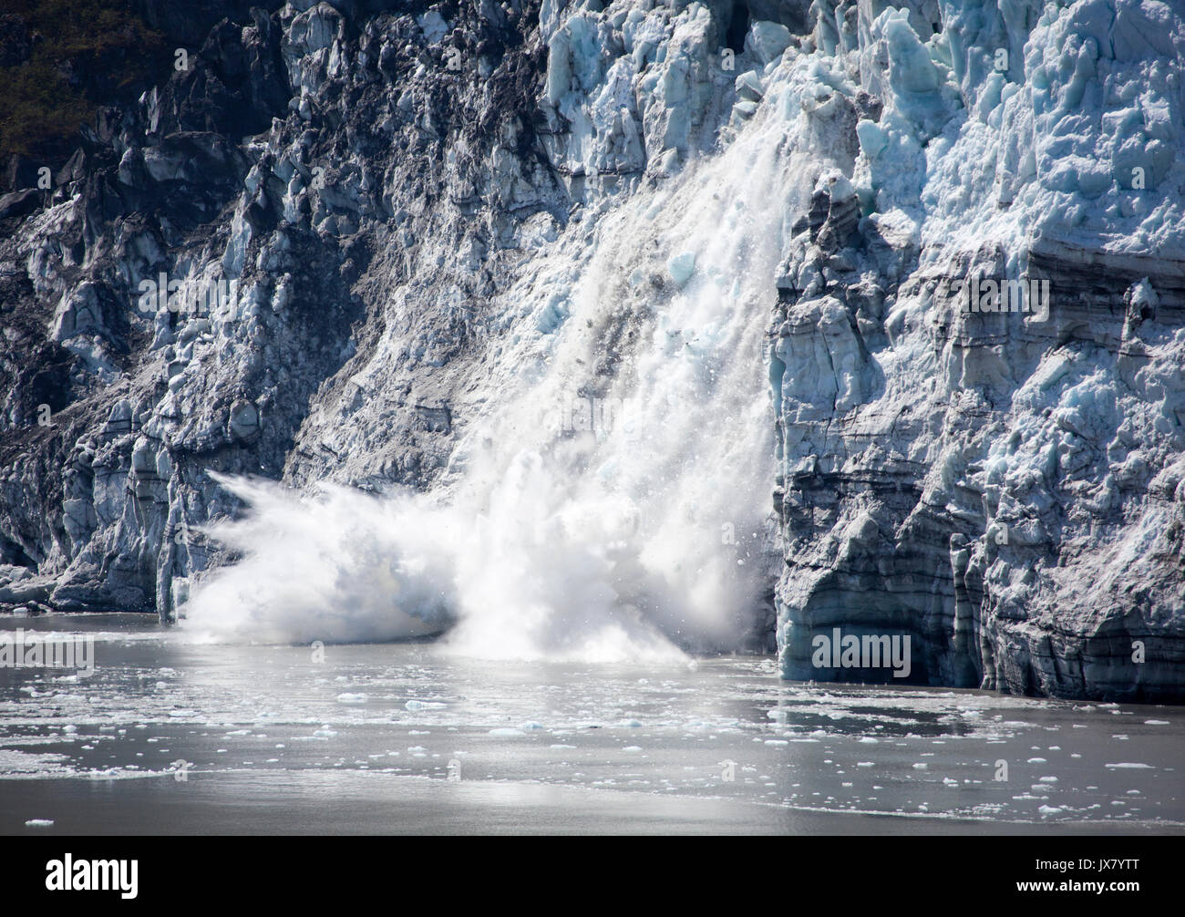 The falling ice of a glacier in Glacier Bay national park (Alaska Stock ...