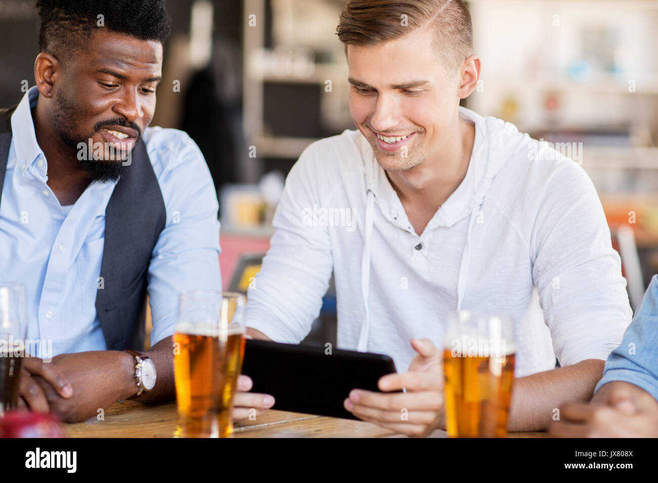 Man tablet drinking draft beer hi-res stock photography and images - Alamy