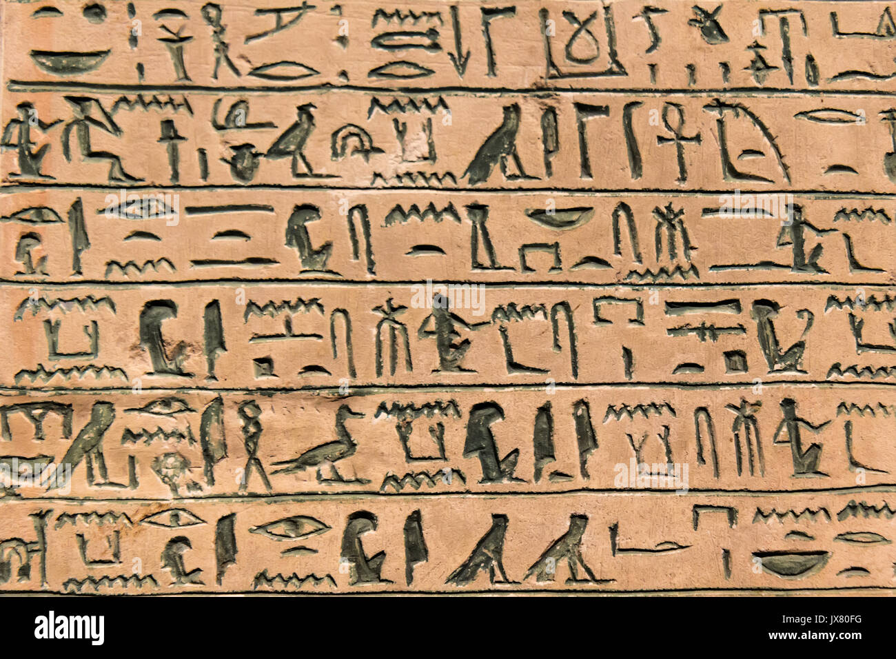 Hieroglyphic carvings on the exterior walls of an ancient egyptian ...