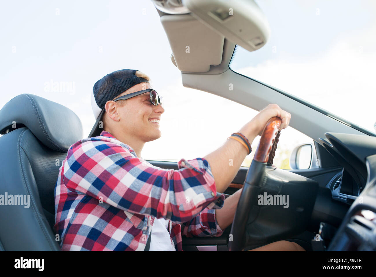 Guy driving convertible hi-res stock photography and images - Alamy