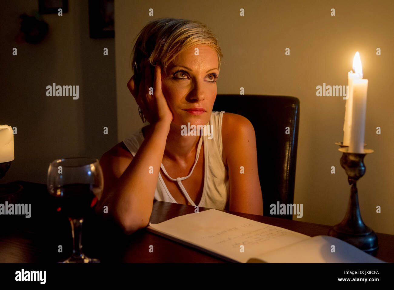 thoughtful woman is writing a letter Stock Photo - Alamy