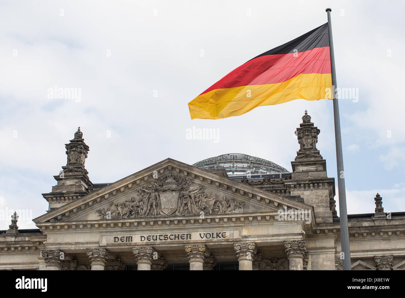 The German flag flying in front of the Reichstag Building in Berlin ...