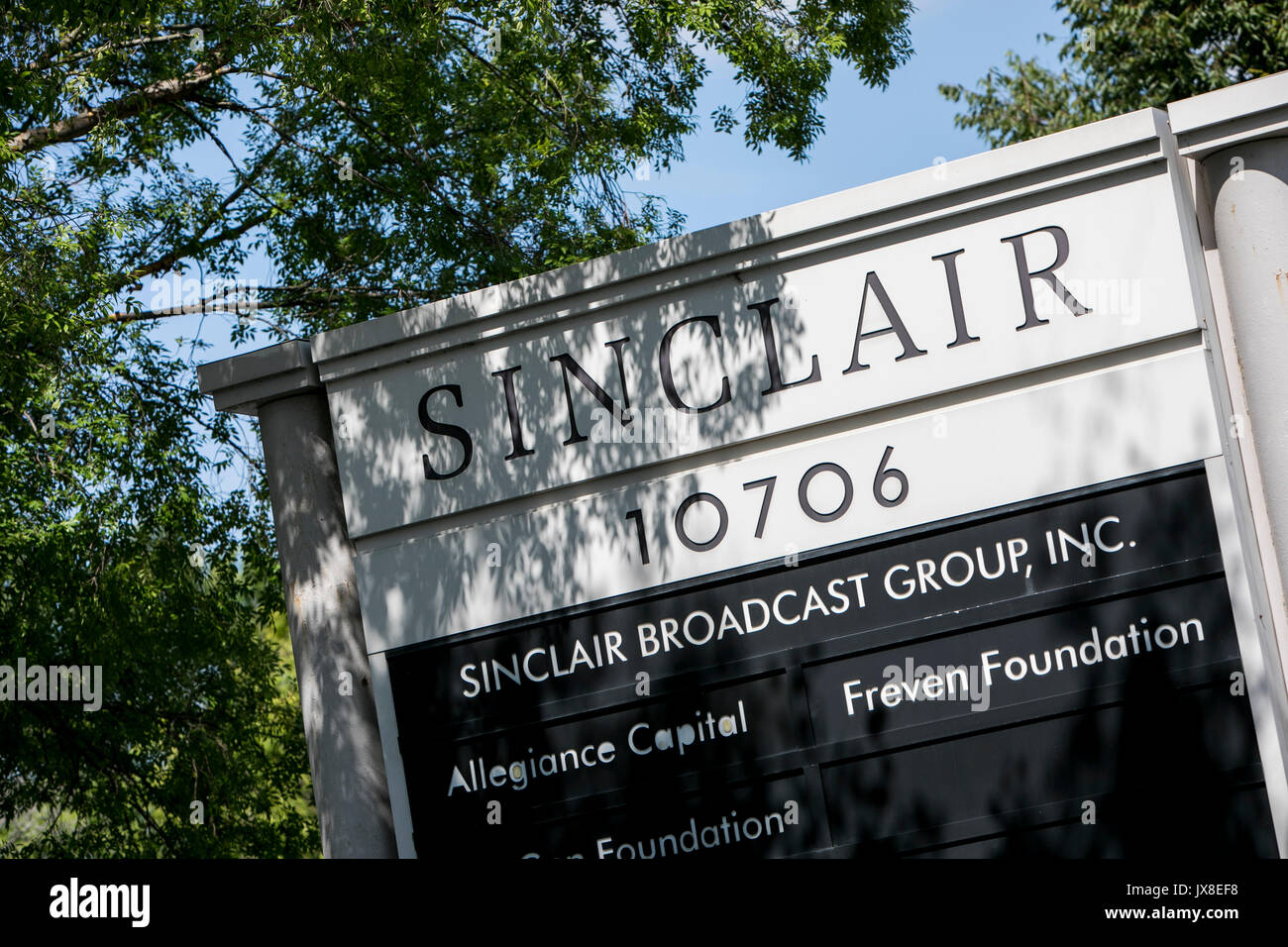 A logo sign outside of the headquarters of the Sinclair Broadcast Group ...