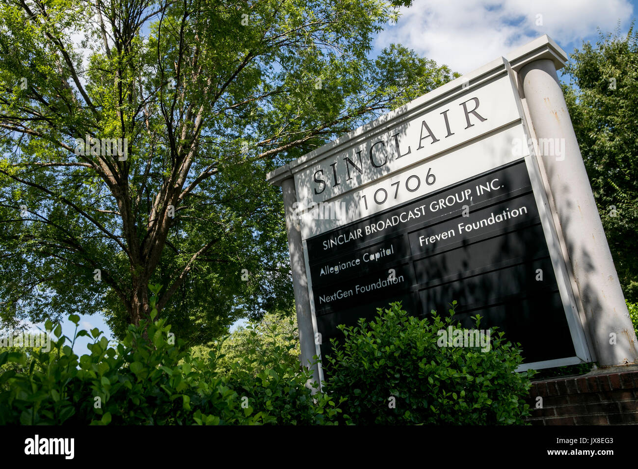 A logo sign outside of the headquarters of the Sinclair Broadcast Group ...