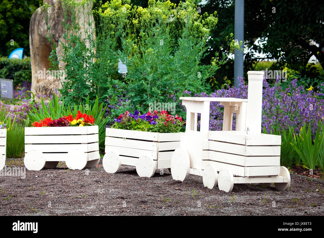 Wagon spring flowers hi-res stock photography and images - Alamy
