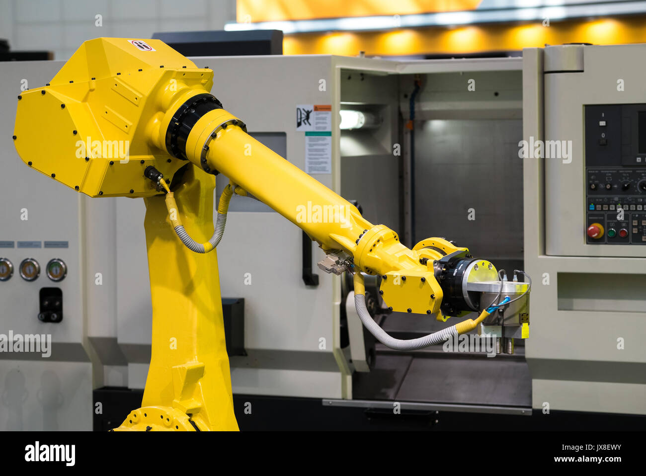 Fully automated CNC machining with handling robot Stock Photo - Alamy