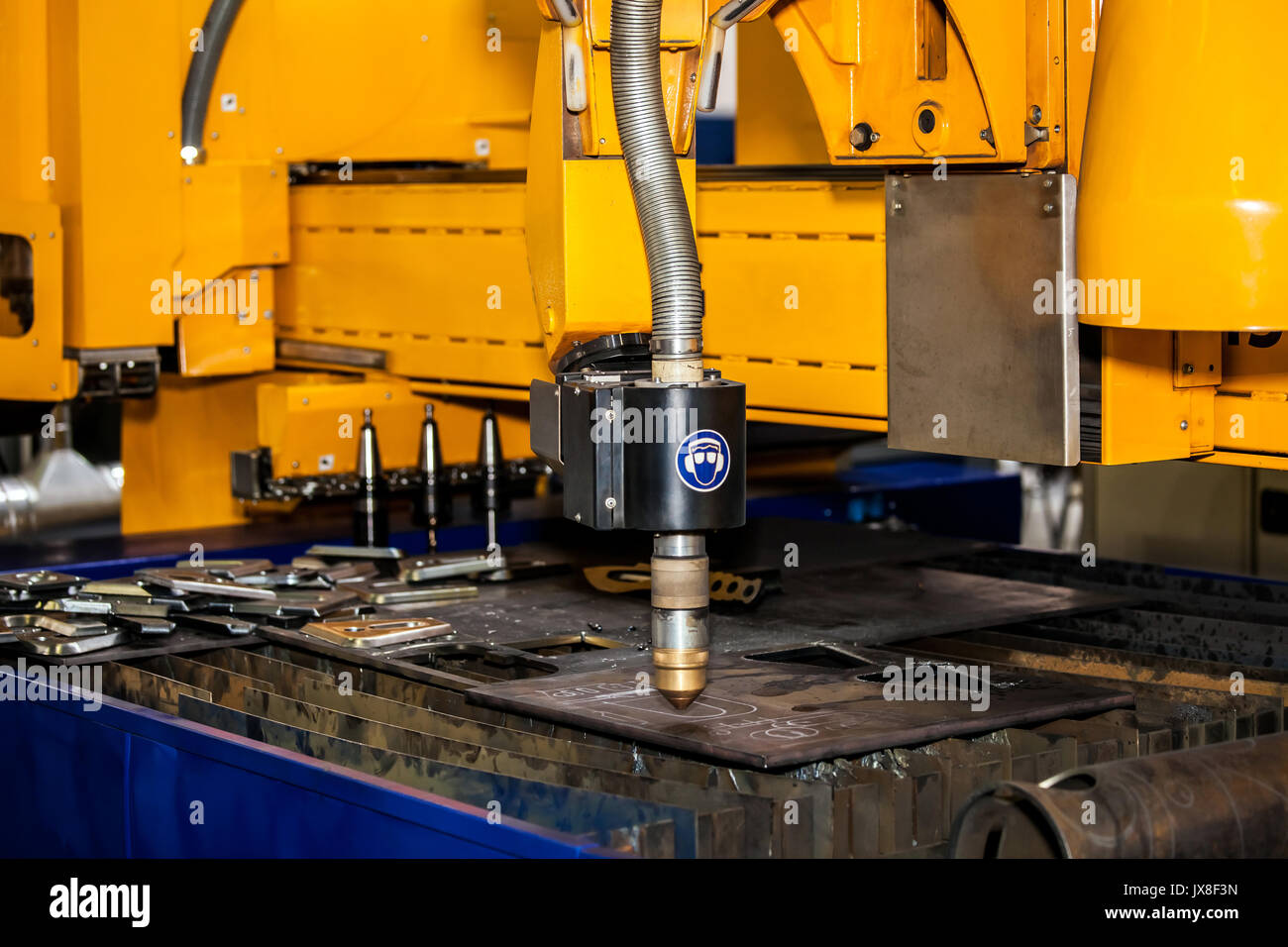 Laser metal sheet machine close up processing Stock Photo - Alamy