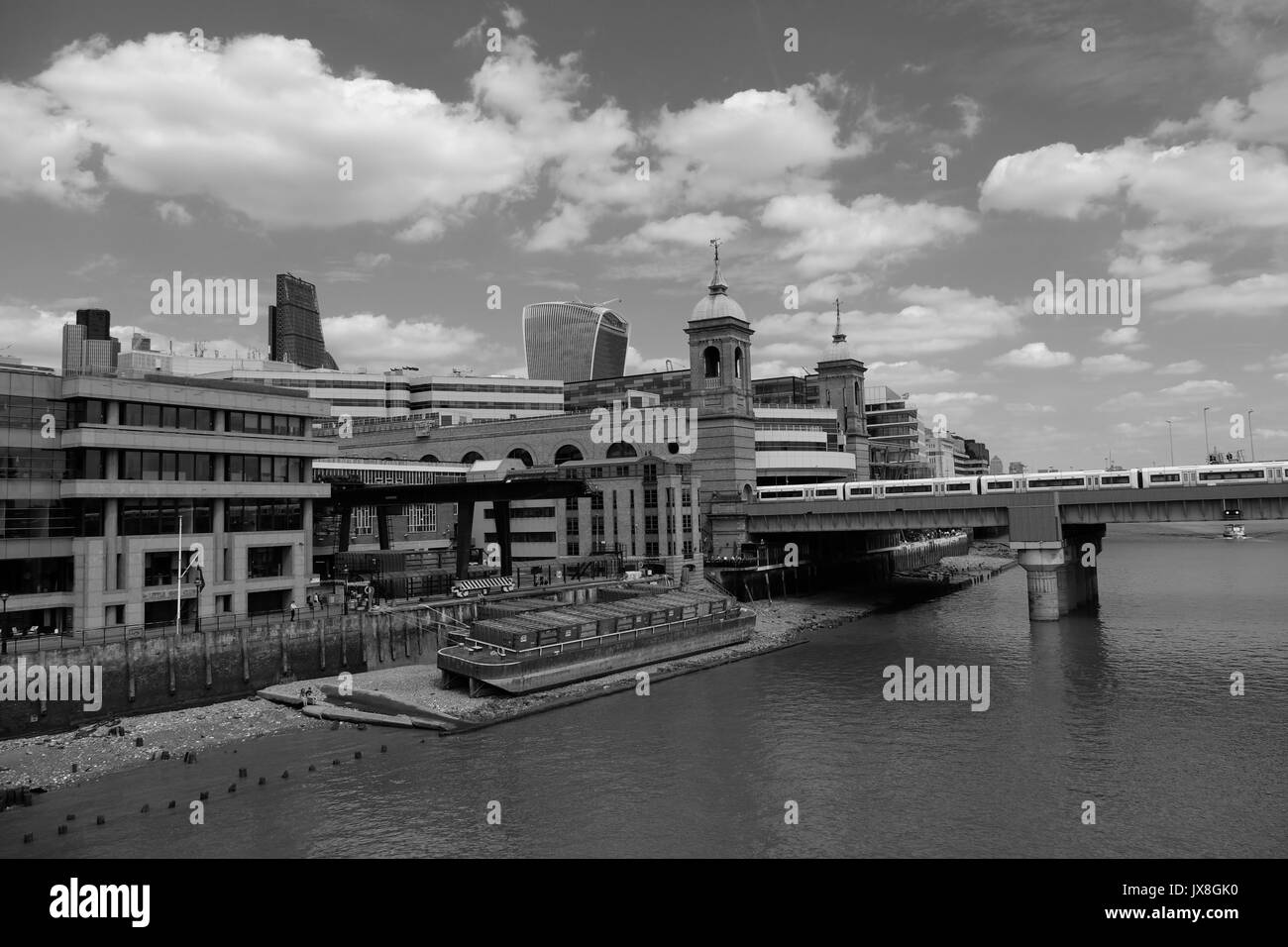 The view from Southwark Bridge showing a train leaving Cannon Street ...