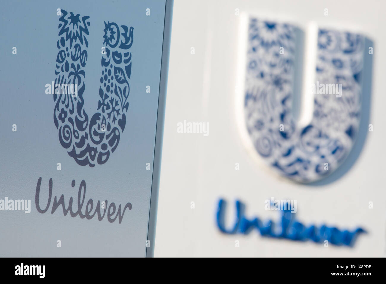 A logo sign outside of a facility occupied by Unilever in Newville ...