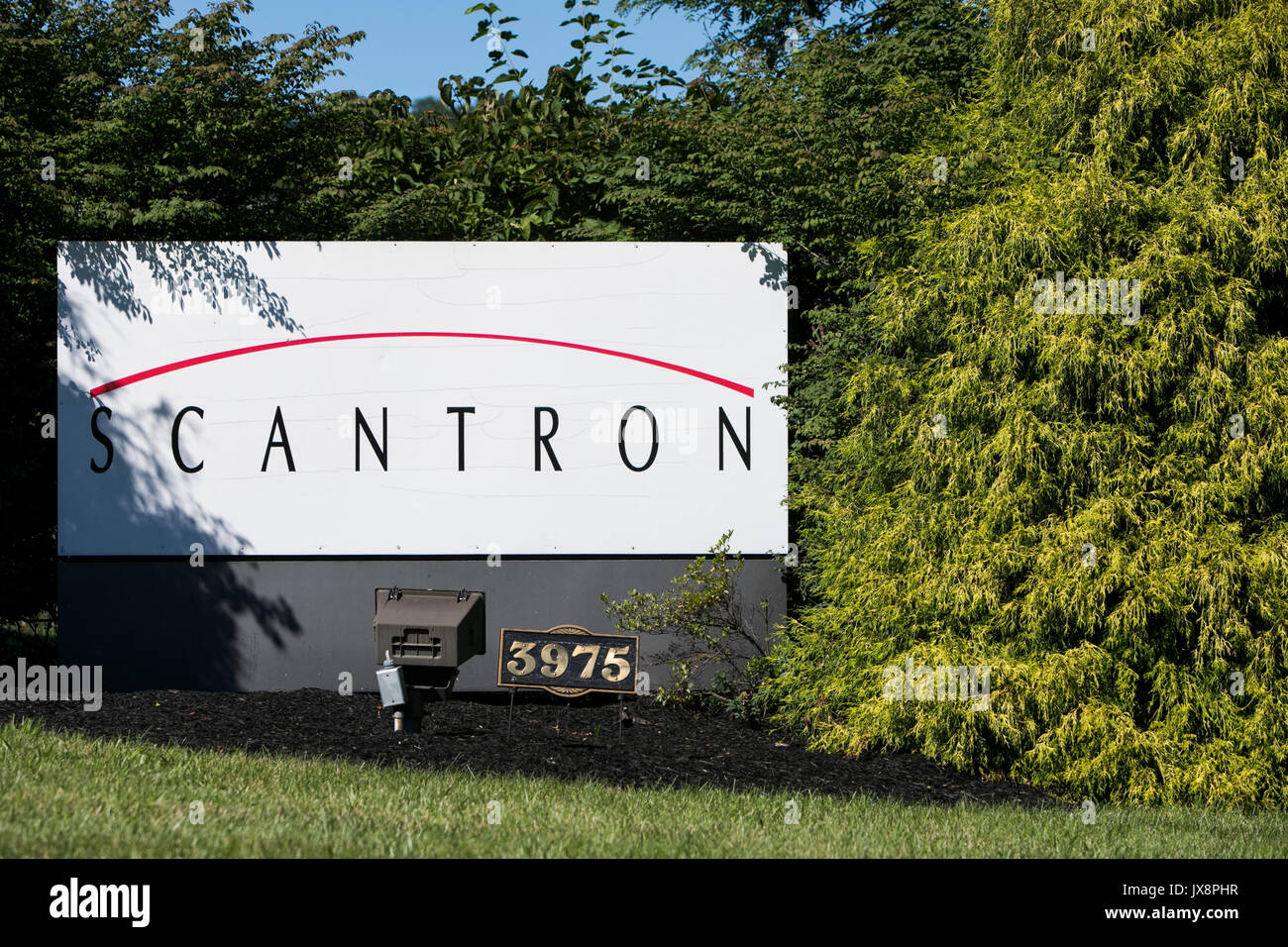 A logo sign outside of a facility occupied by the Scantron Corporation ...