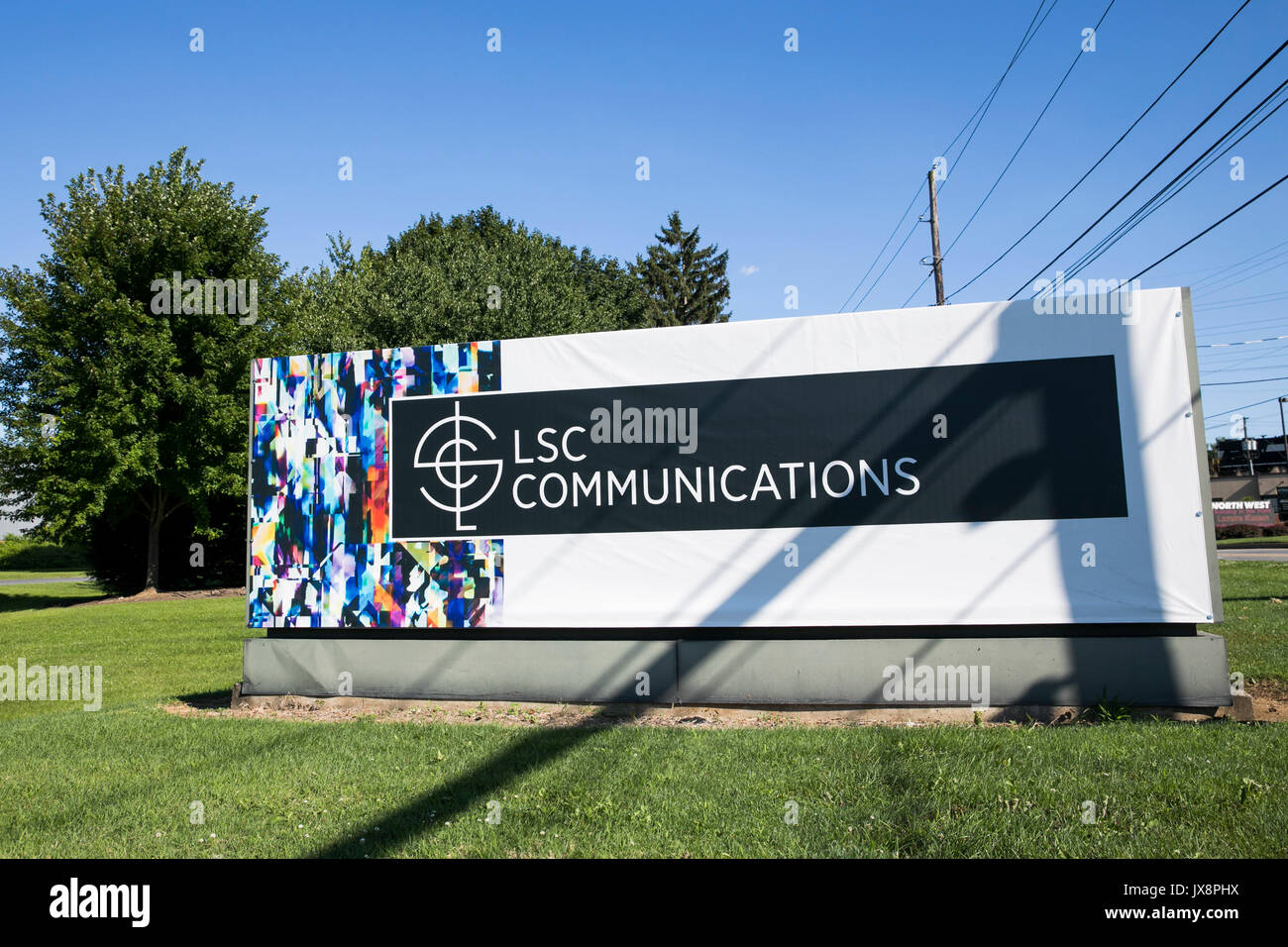A logo sign outside of a facility occupied by LSC Communications in ...