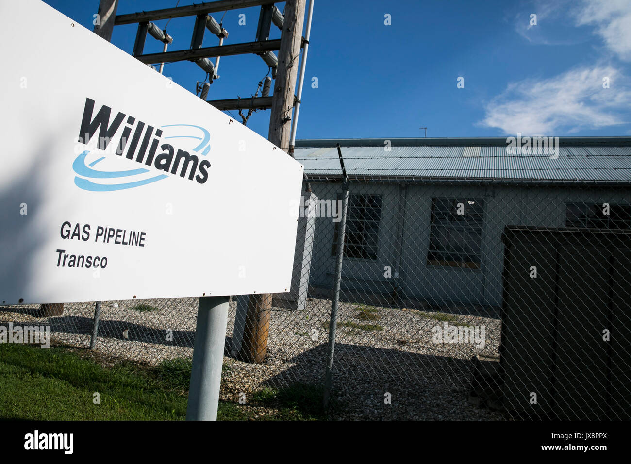 A logo sign outside of a facility occupied by The Williams Companies ...
