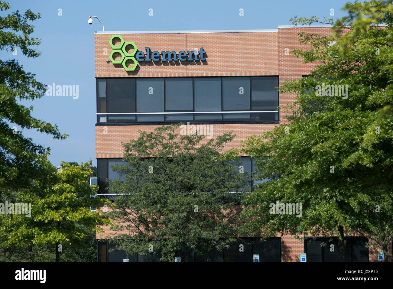 A logo sign outside of a facility occupied by Element Fleet Management ...