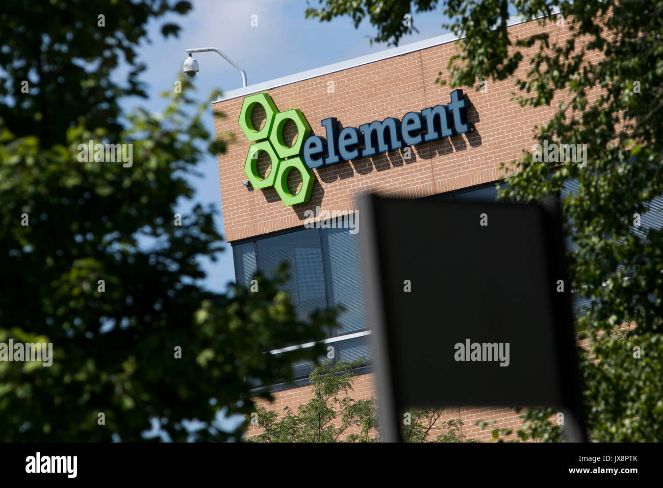 A logo sign outside of a facility occupied by Element Fleet Management ...