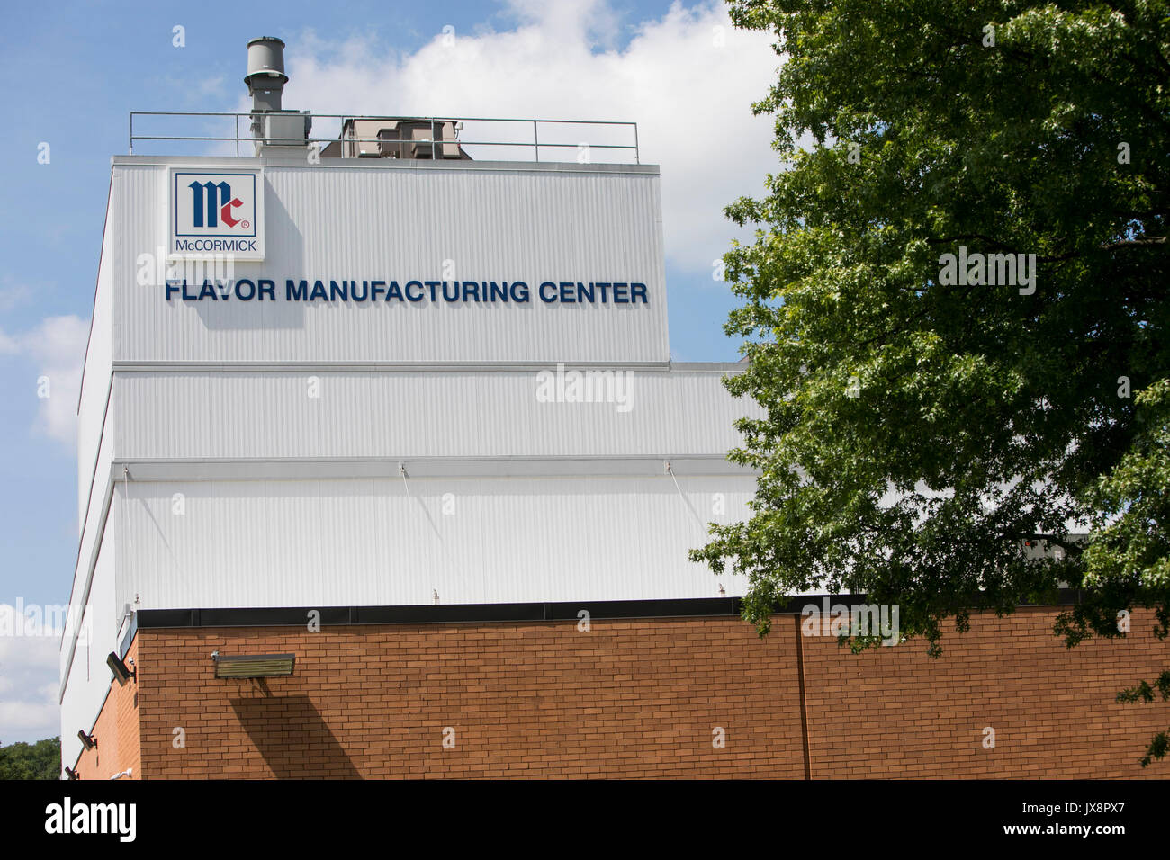 A logo sign outside of a facility occupied by McCormick & Company in ...