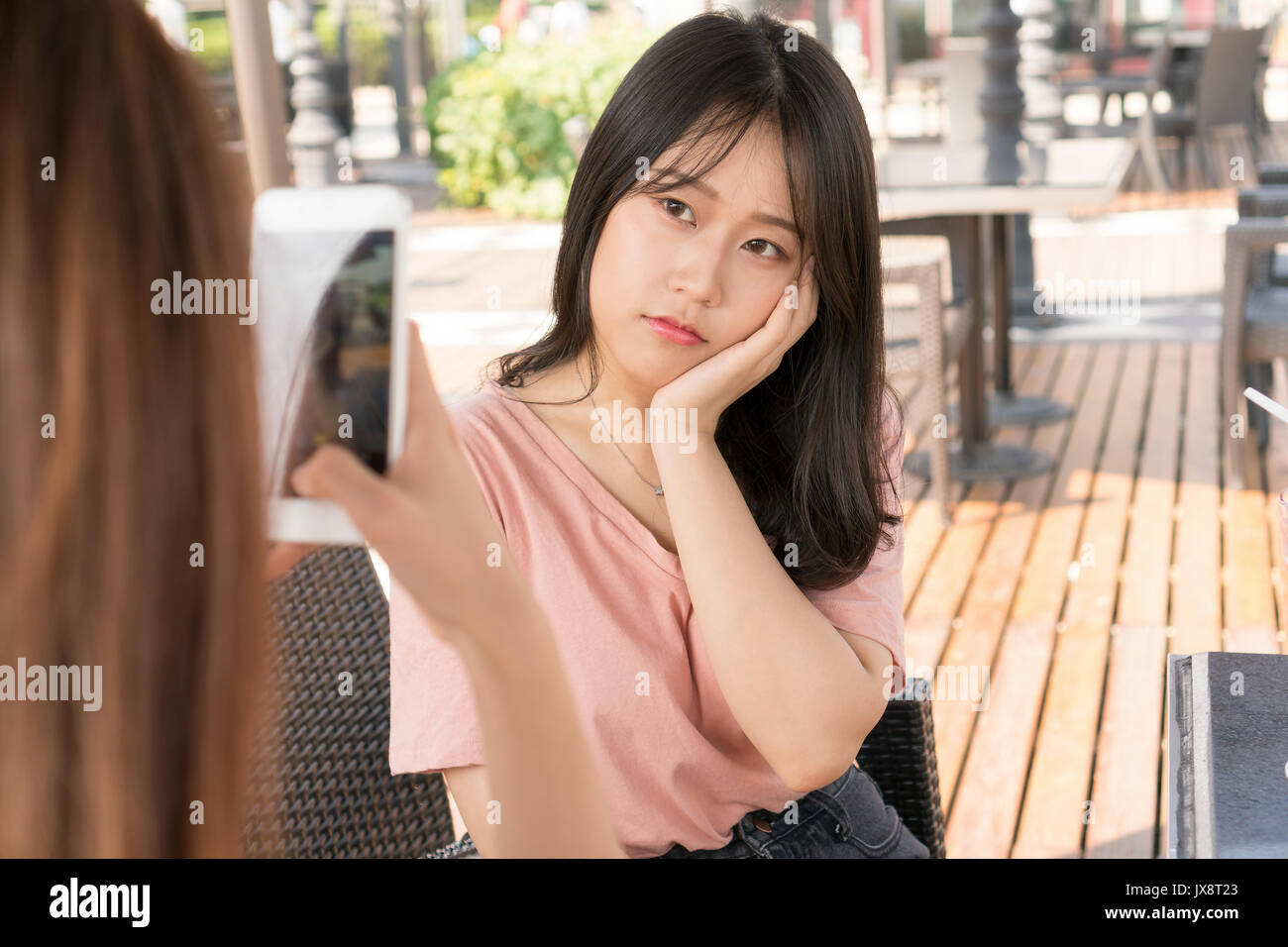 two girls making photos Stock Photo - Alamy